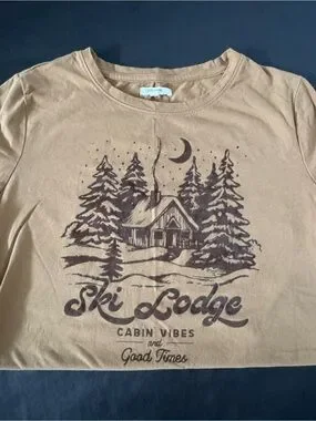 Maurices | Tops | Maurices Tan Ski Lodge Graphic Short Sleeve Tee ...